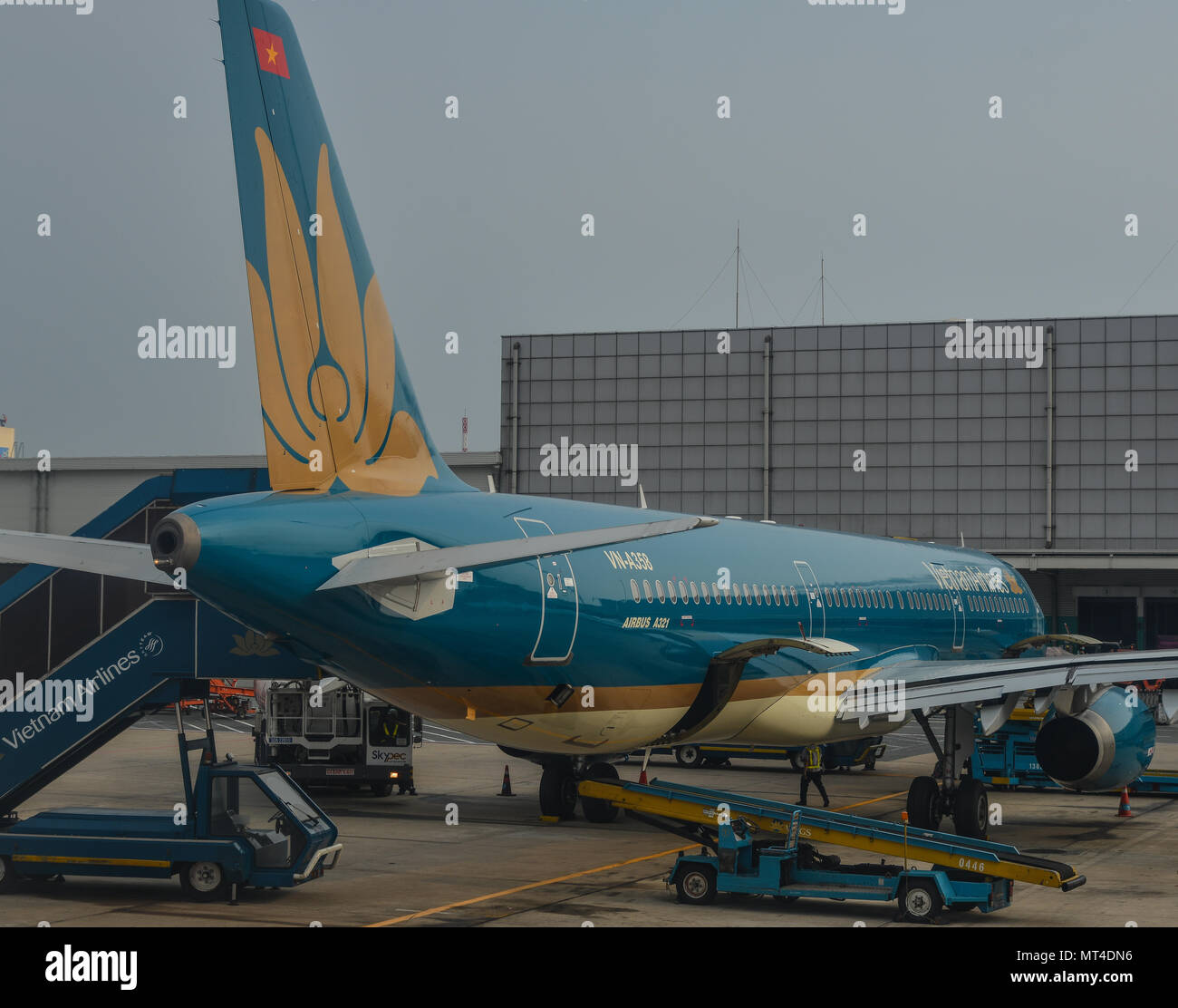 Saigon, Vietnam - May 5, 2018. Passenger airplanes docking at Tan Son ...