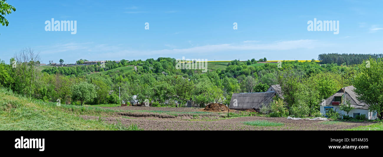 Panoramic view of a typical rural area in the early spring during the ...