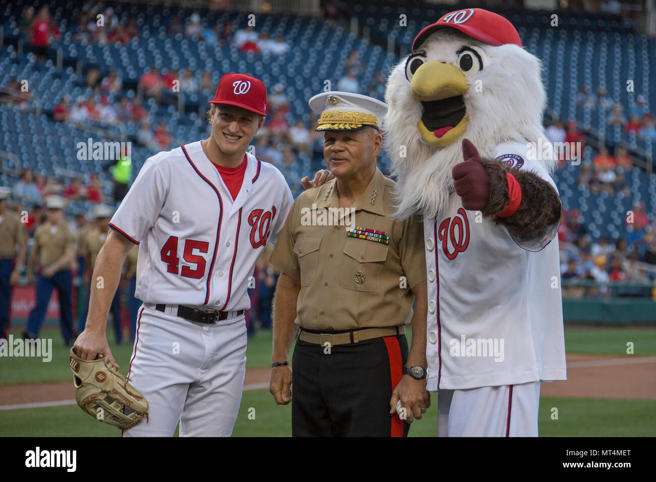 Commandant of the Marine Corps Gen. Robert B. Neller, center, and ...