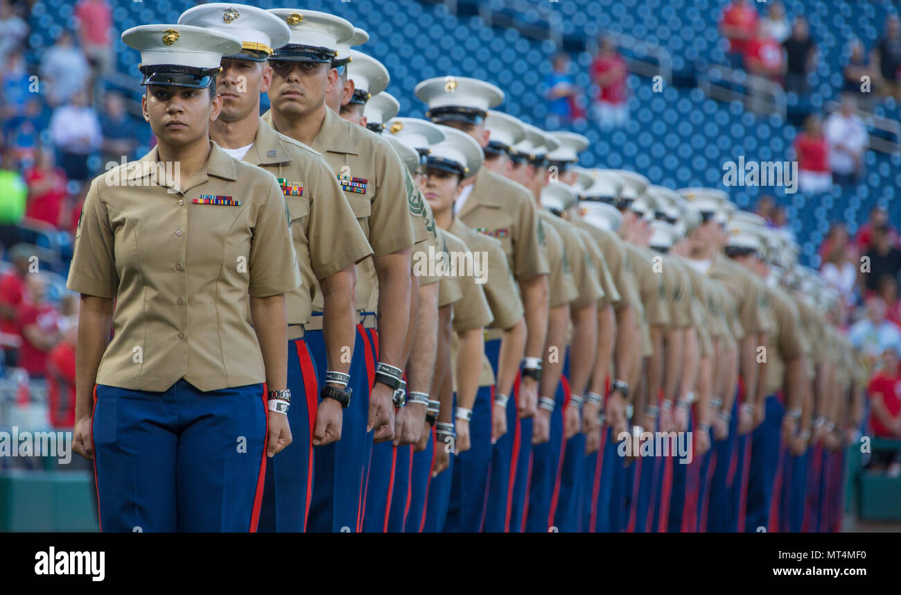 U.S. Marines from the National Capitol Region stand at the position of ...