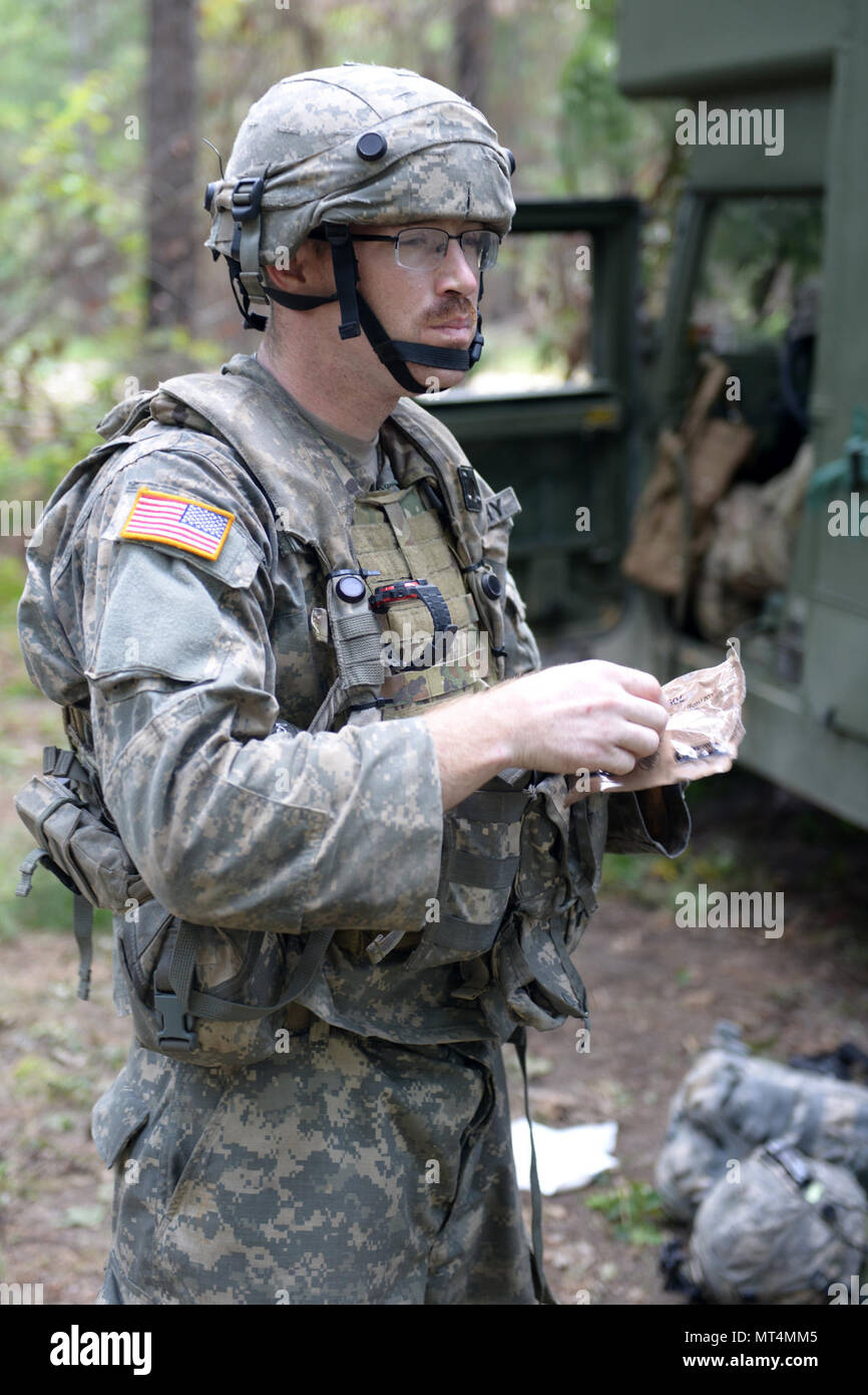 Indiana National Guard Sgt. Corey Olive, of Sunman and a Troop A, 1st ...