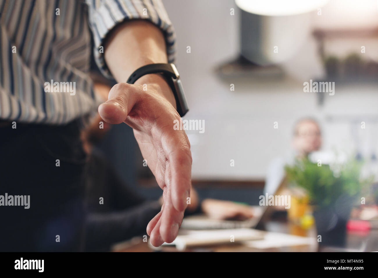 Closeup view of male hand with smart watch. Businessman giving his hand ...