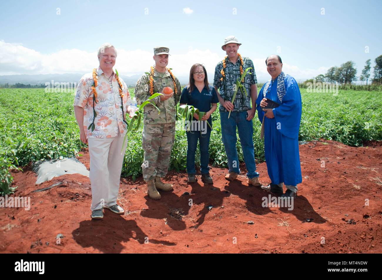 WAHIAWA, Hawaii — Guests receive a piece of the ti leaf used in the R-1 ...