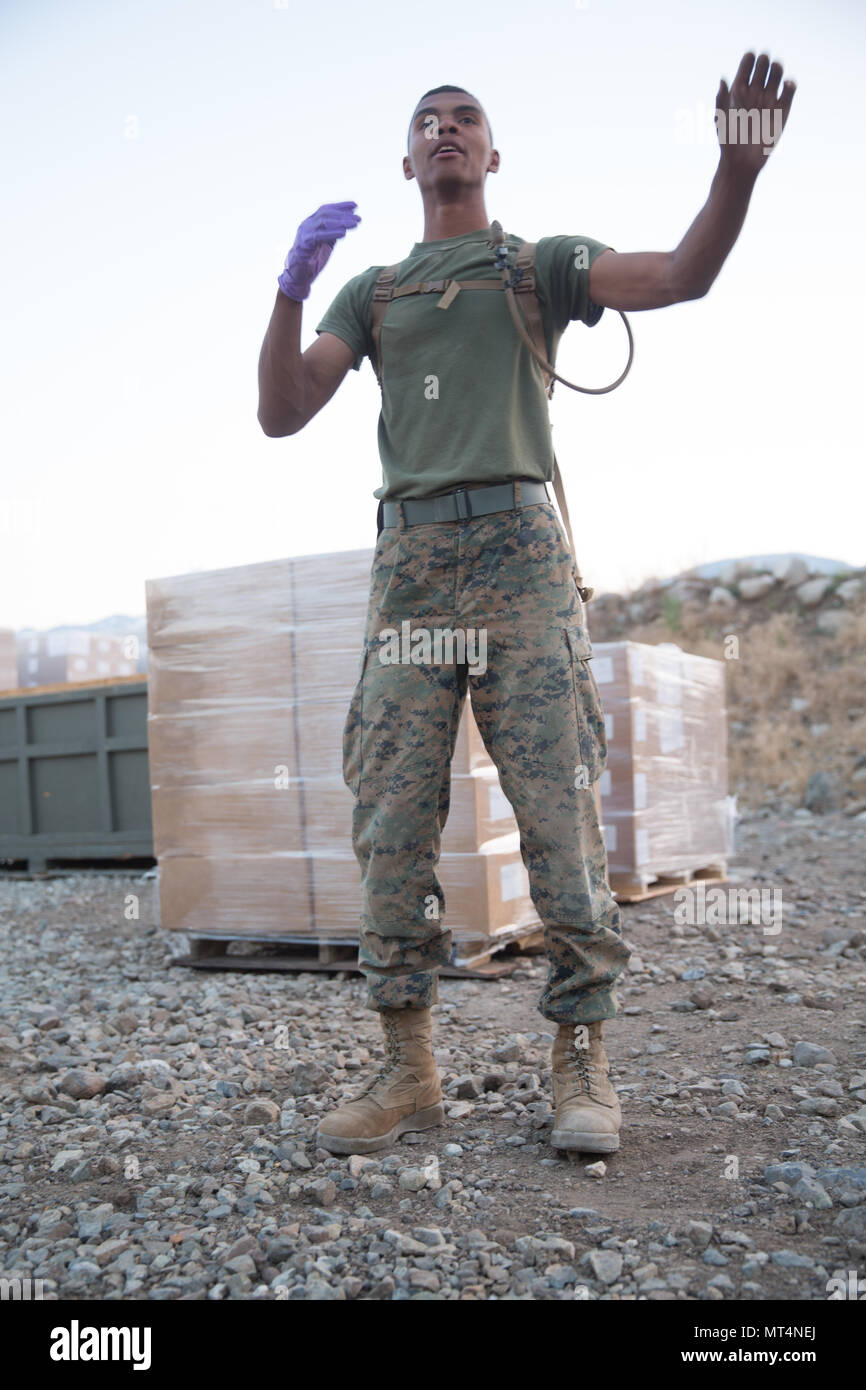 U.S. Marine Cpl. Shawn Pettway, a landing support specialist with ...