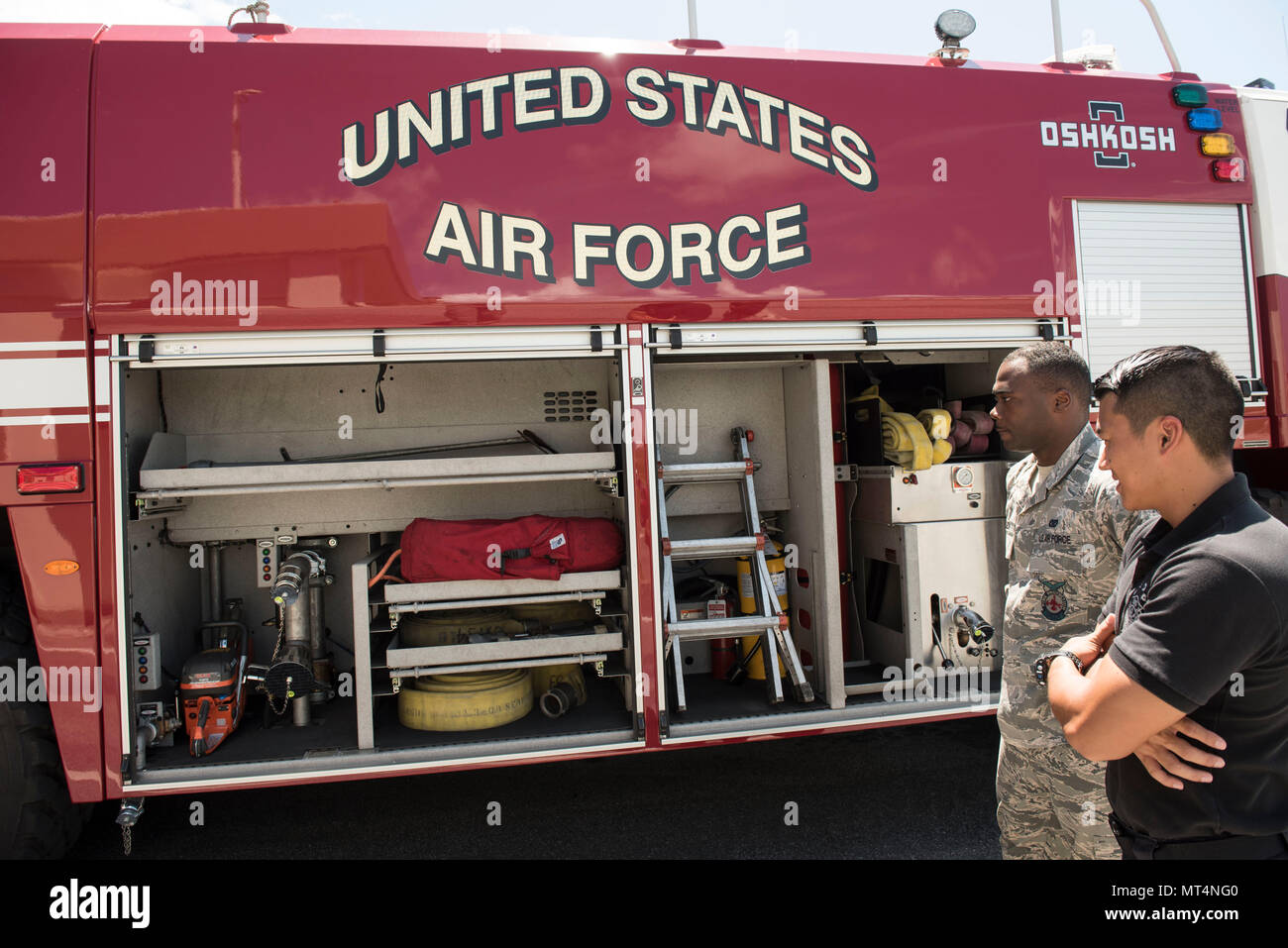 U.S. Air Force Senior Airman Korey Wilson and Yuhei Tajima, 18th Civil ...