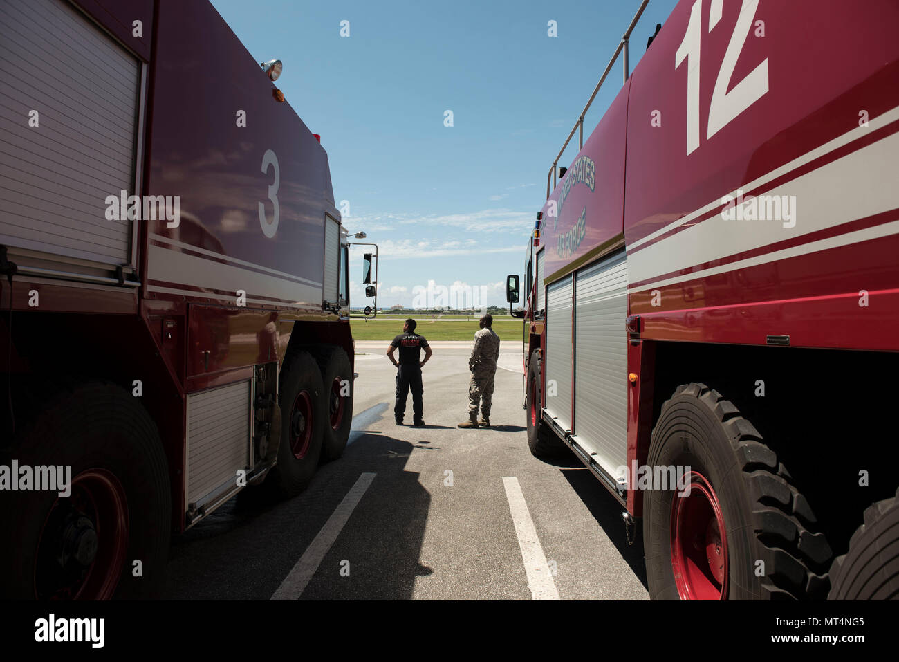 Firefighters from the 18th Civil Engineer Squadron standby with their ...