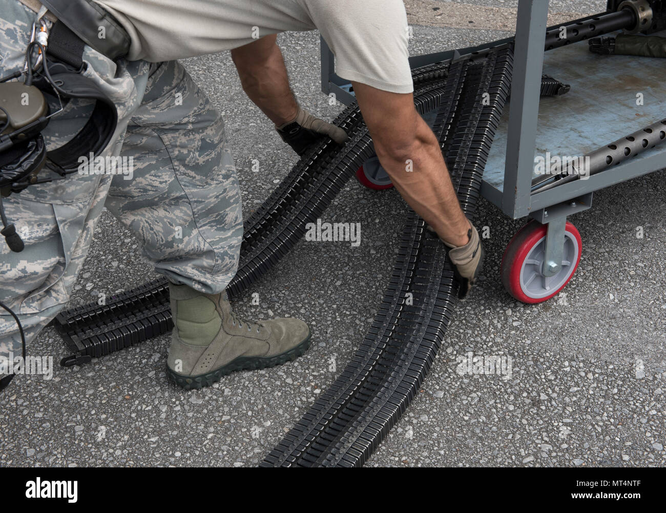 A U.S. Air Force Airman from the 33rd Helicopter Maintenance Unit ...