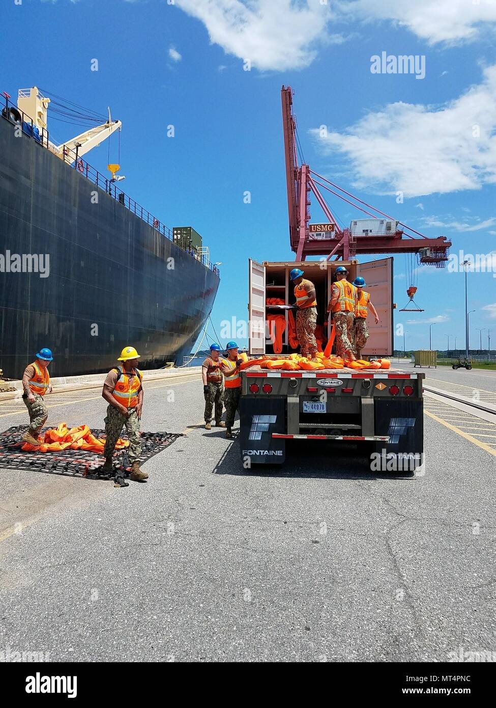 Sailors assigned to NCHB-1 prepare to conduct backload operations of ...