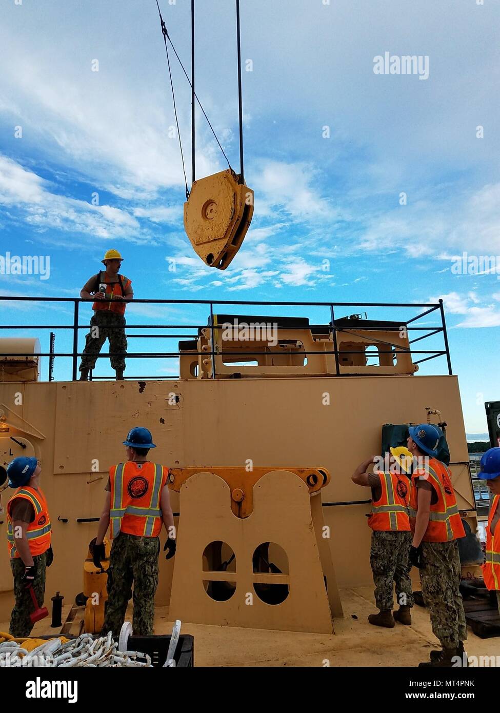 Sailors assigned to NCHB-1 prepare the crane for Lift On/Lift Off (LO ...