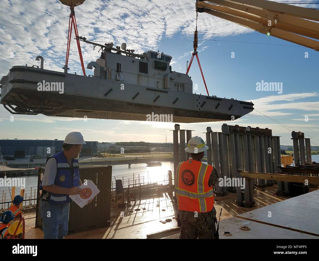 Sailors assigned to NCHB-1 conducting backload operations onboard USNS ...