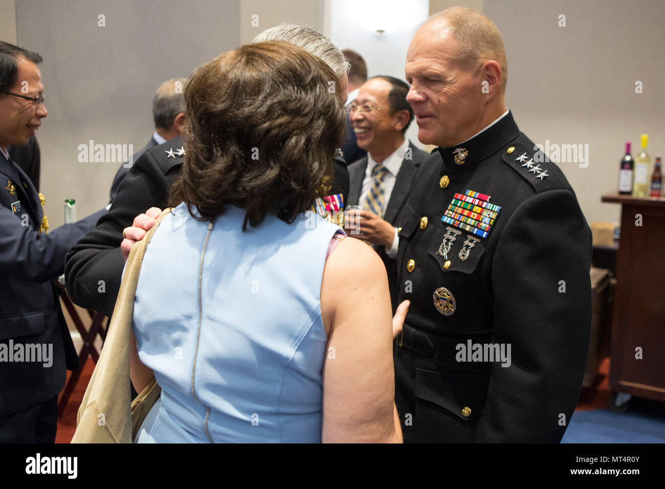 Commandant of the Marine Corps Gen. Robert B. Neller speaks with guests ...