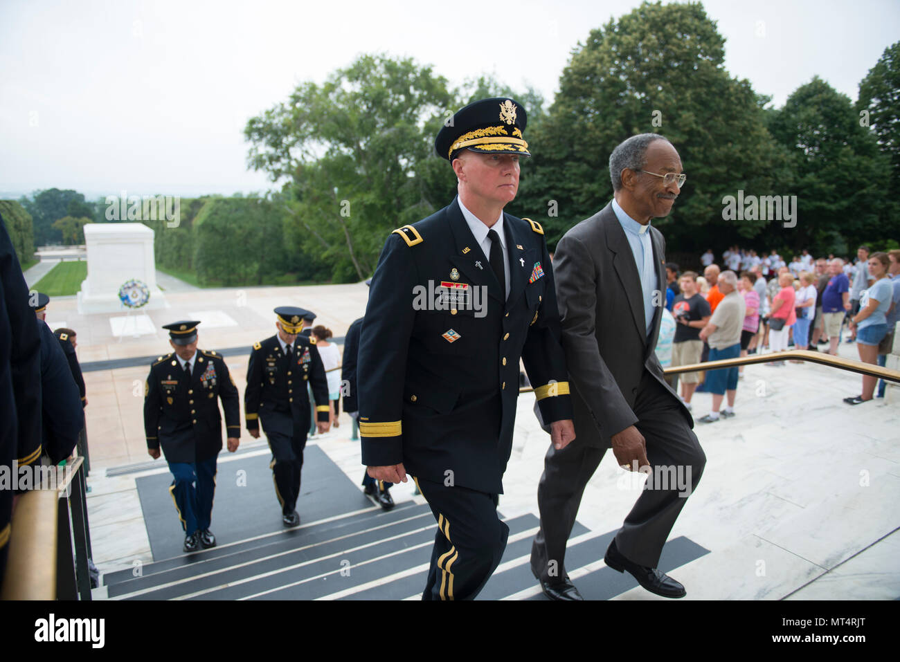 U.S. Army Chaplains and family members walk through the Memorial ...