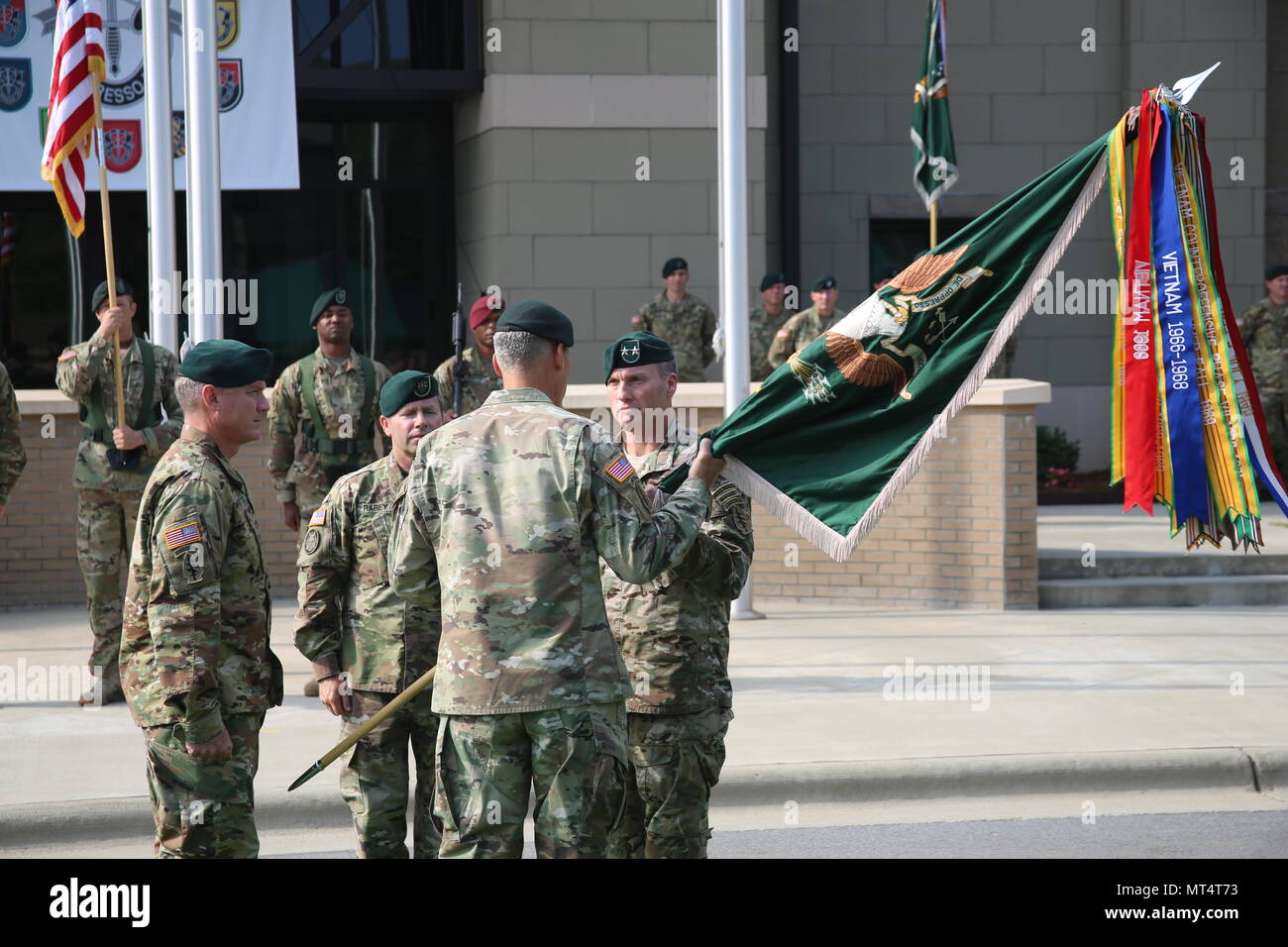 Maj. Gen. James E. Kraft Jr. passes the 1st Special Forces Command ...