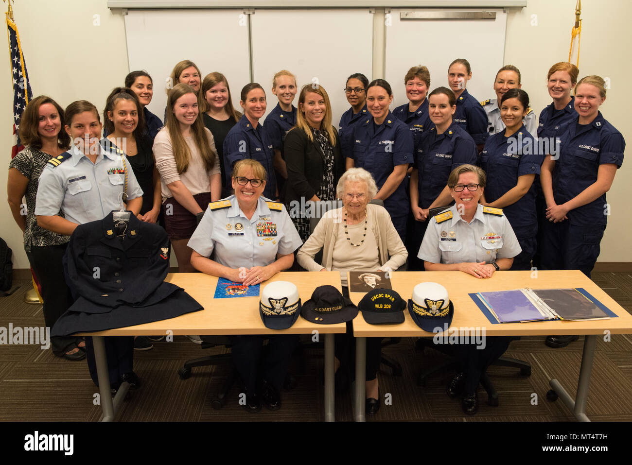 Women from the District Nine Coast Guard community gather around Mabel ...