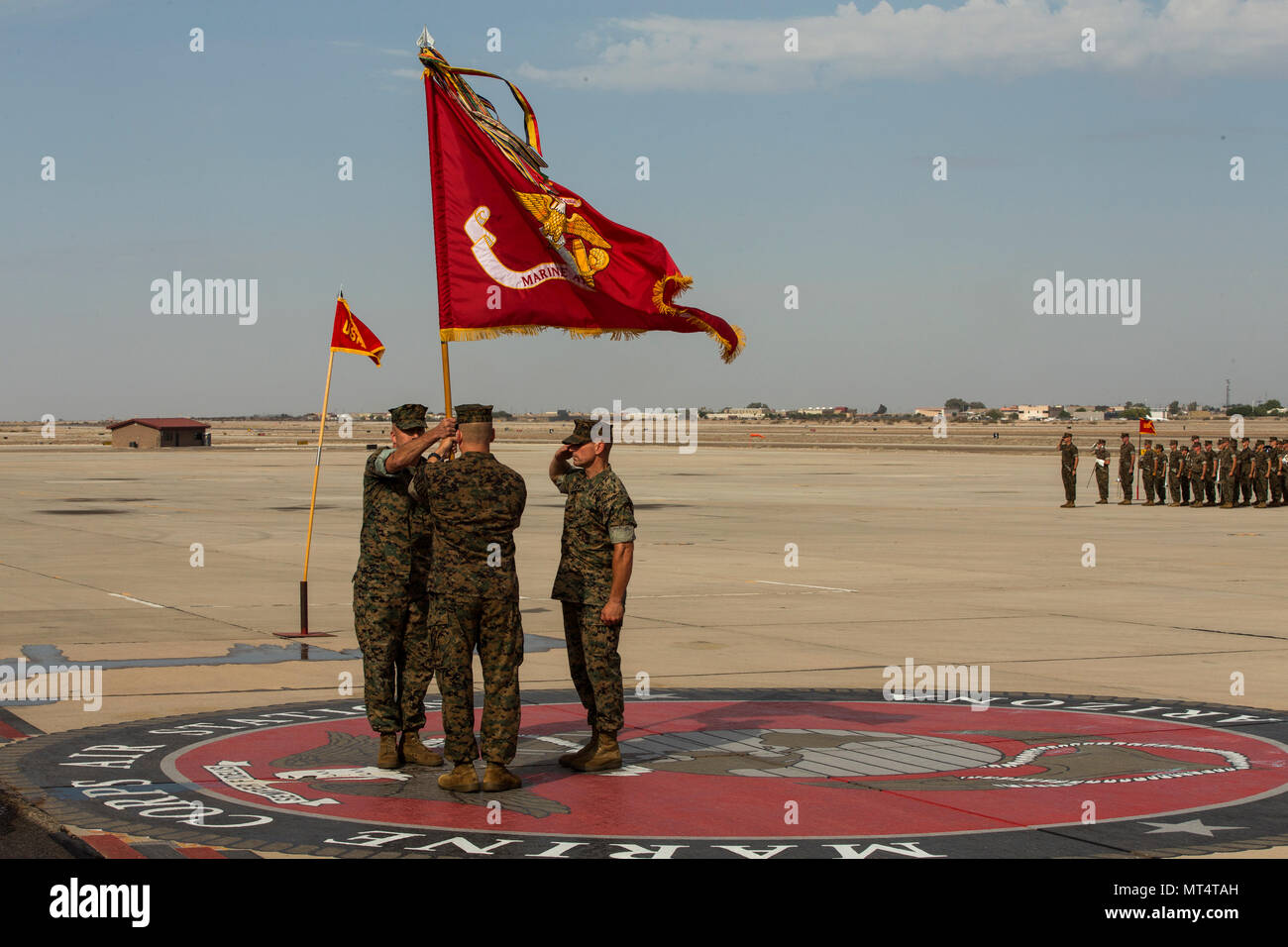 U.S. Marine Corps Col. Marcus B. Annibale (middle), the outgoing ...