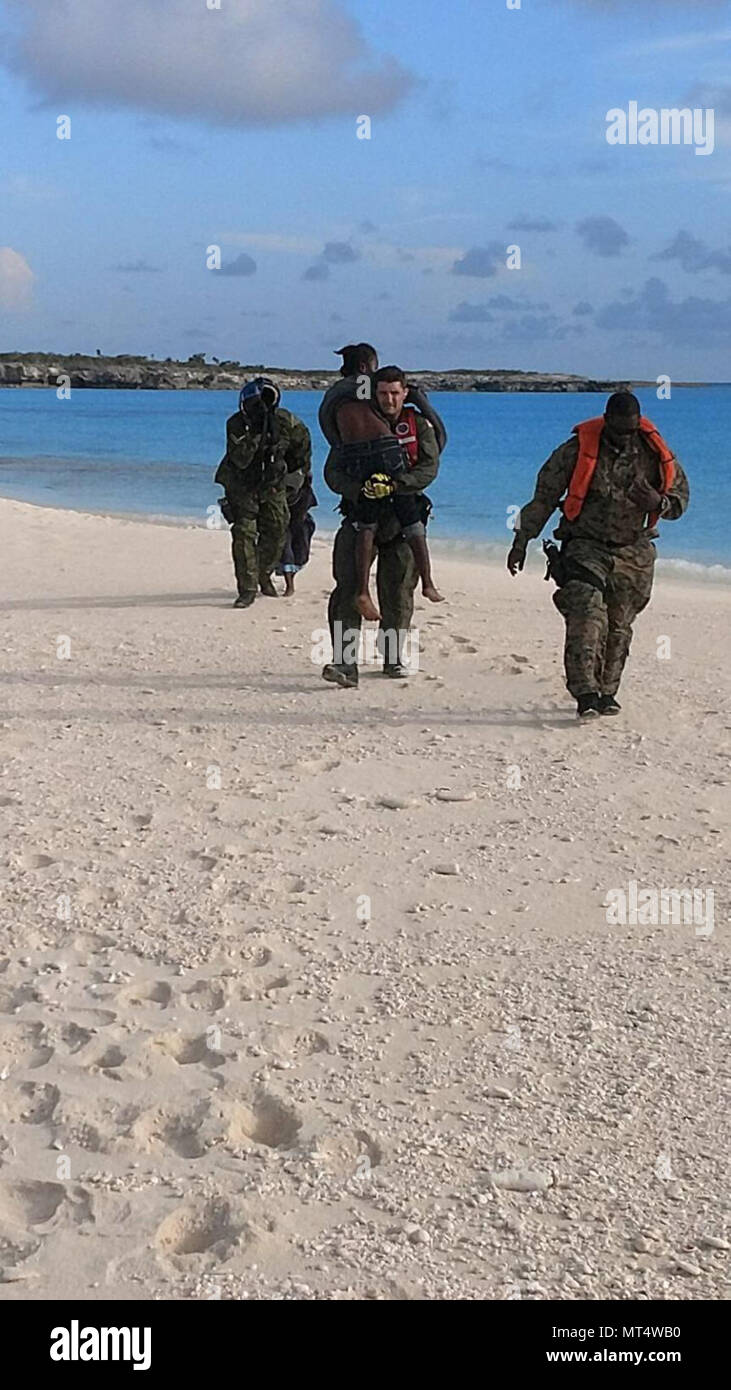Coast Guard Petty Officer 2nd Class Scott Garren, an MH-60 Jayhawk ...