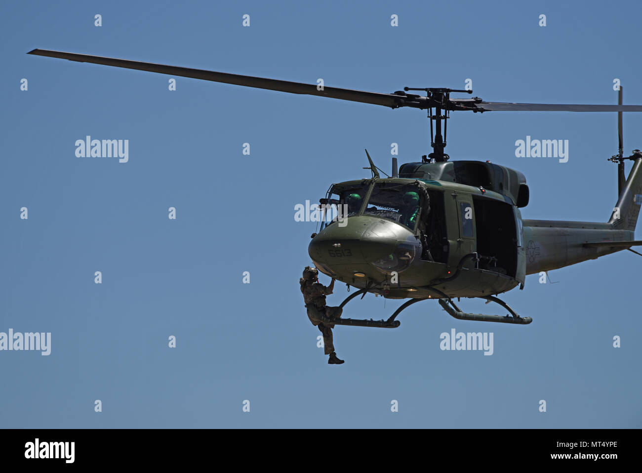 Airmen with the 36th Rescue Squadron perform a simulated combat search ...