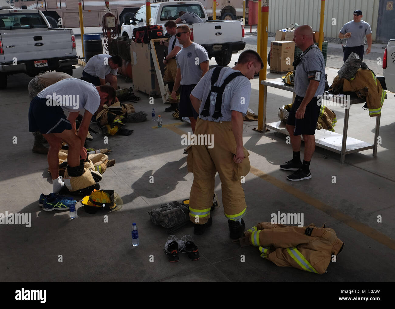 Airmen hustle to don protective equipment during Fire Immersion ...