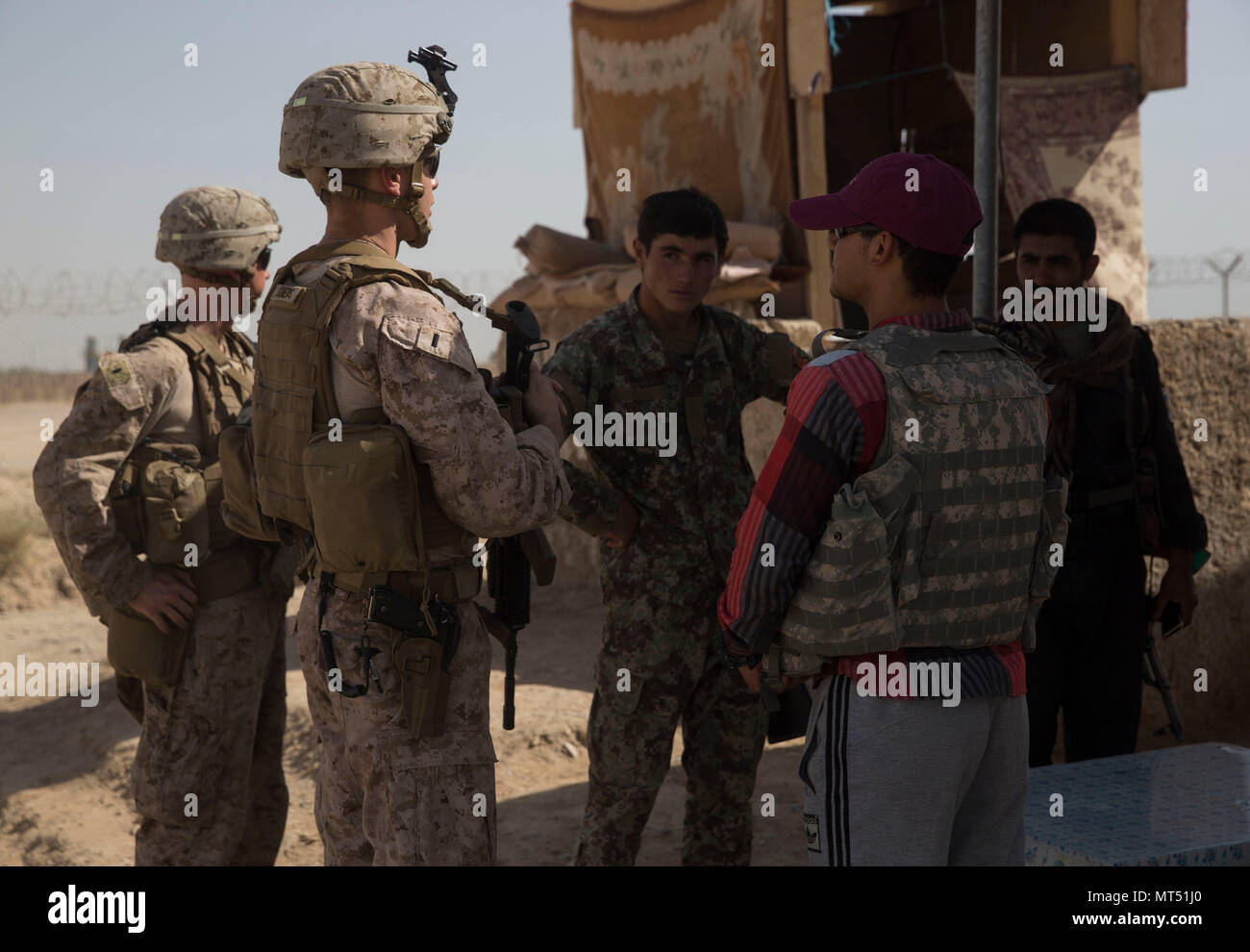 U.S. Marine advisors with Task Force Southwest speak with the ...
