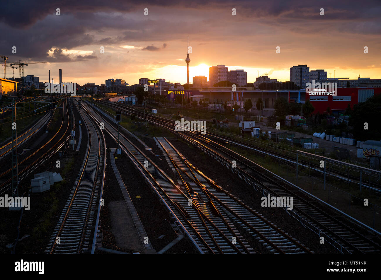 The sun sets over the TV Tower in Alexanderplatz. Seen from Warschauer ...
