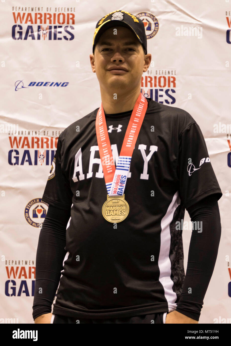 Sgt. Patrick Haney from Albuquerque, New Mexico, poses with his gold ...