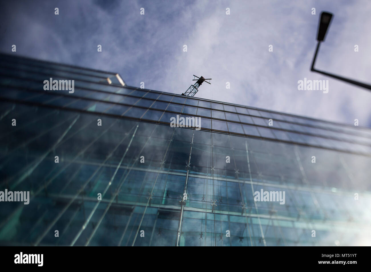 The hoist for a window cleaner's box at the top of an office building ...