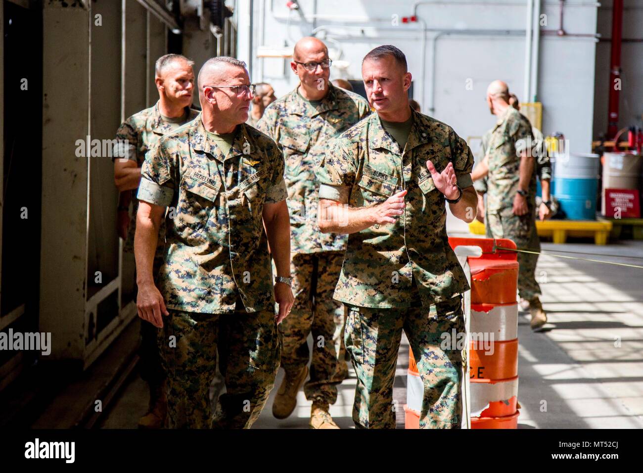 U.S. Marine Corps Lt. Col. Brendan C. Burks, right, commanding officer ...