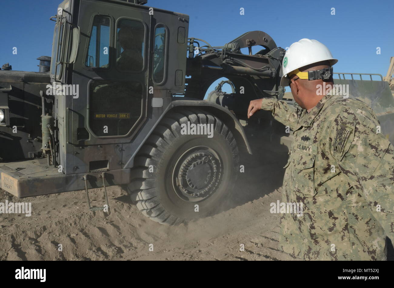 U.S. Navy Reserve Sailor Petty Officer 1st Class Domingo Fuentes of the ...