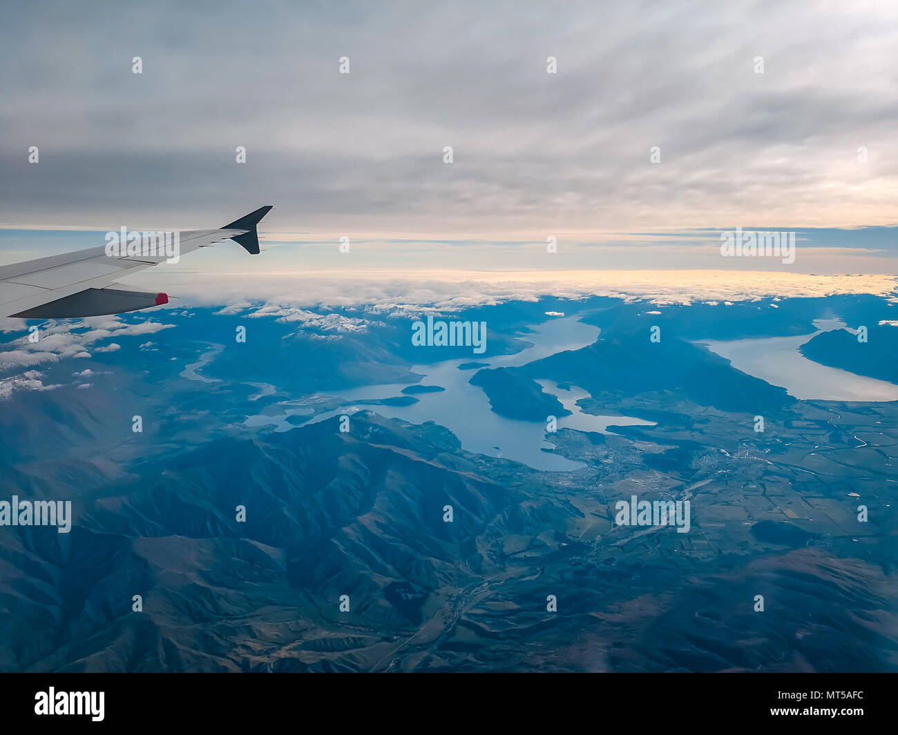 Aerial View from an Airplane Window flying over queenstown New Zealand ...
