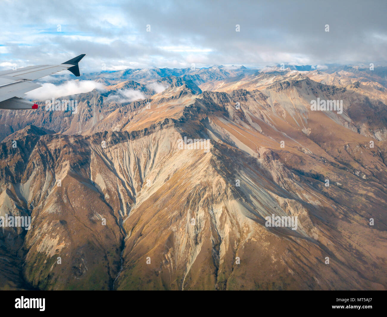 Aerial View from an Airplane Window flying over queenstown New Zealand ...