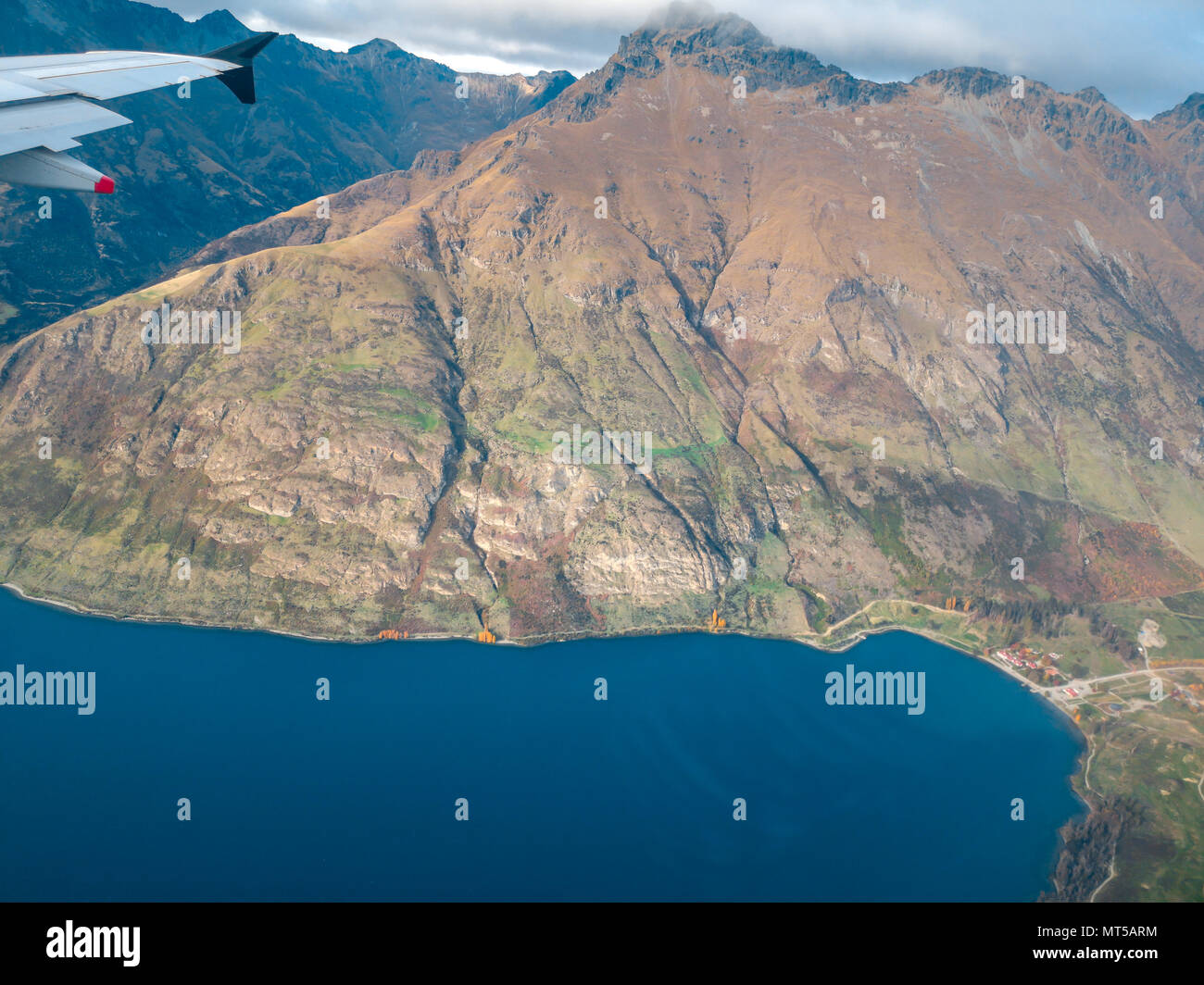 Aerial View from an Airplane Window flying over queenstown New Zealand ...