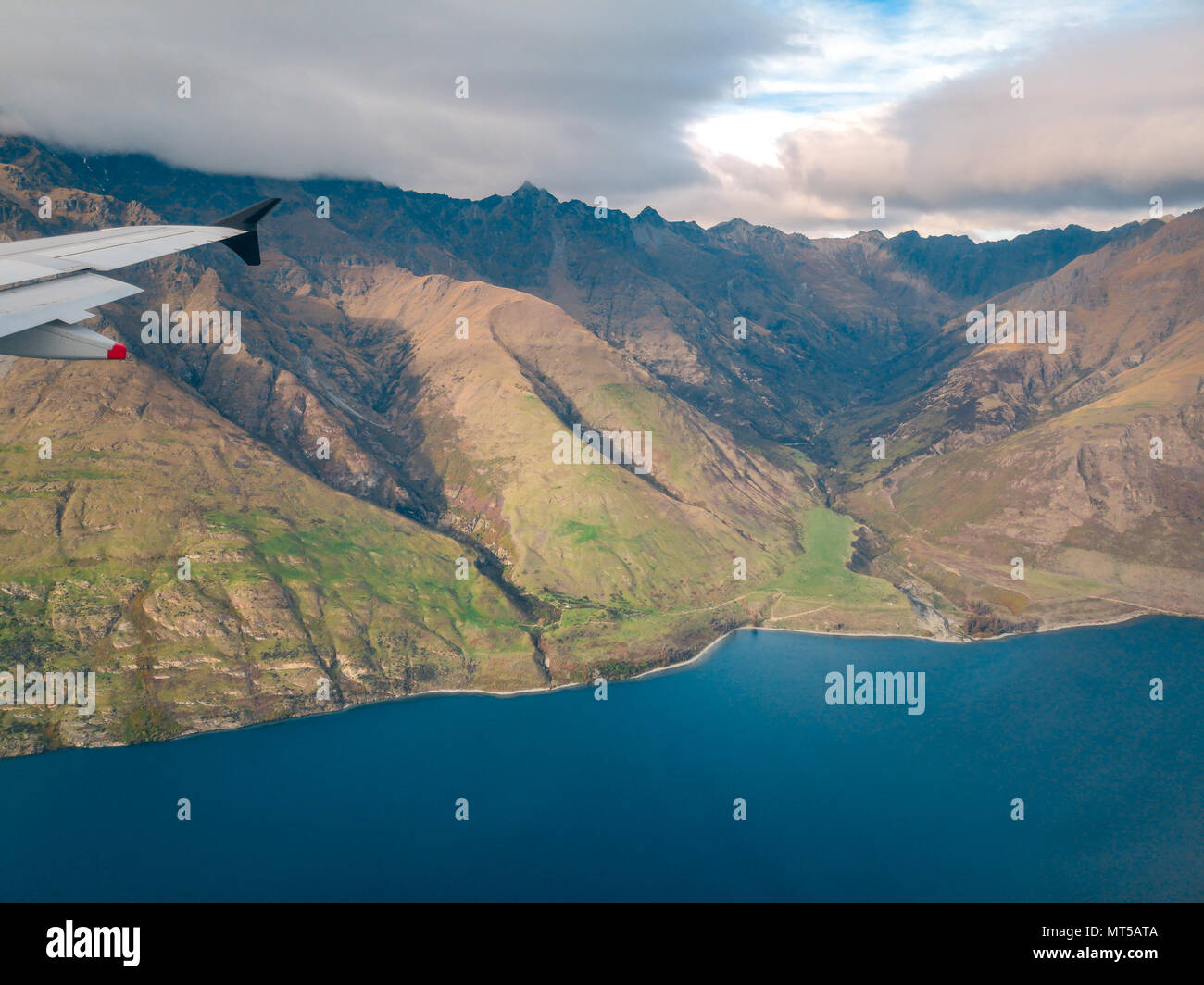 Aerial View from an Airplane Window flying over queenstown New Zealand ...