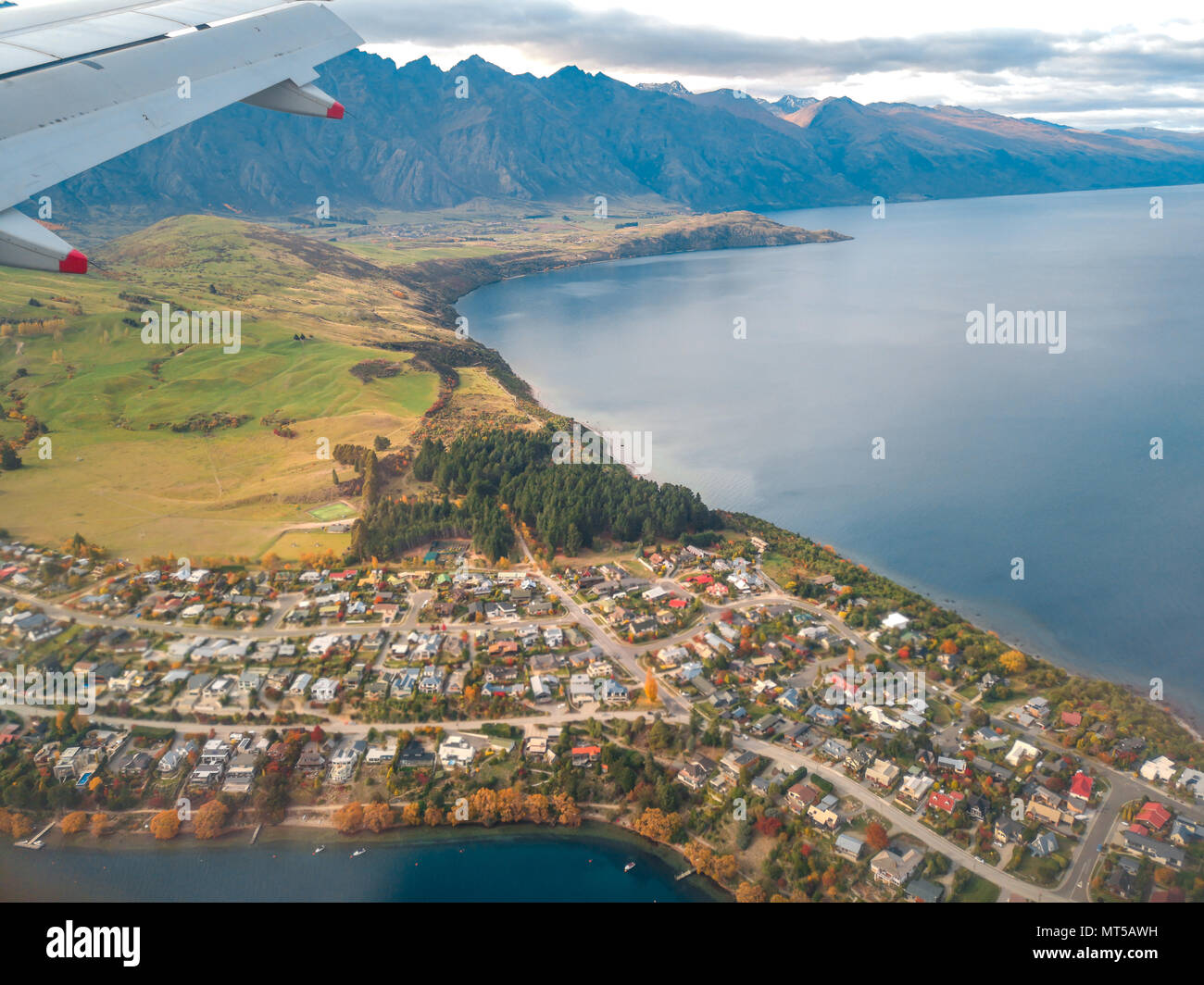 Aerial View from an Airplane Window flying over queenstown New Zealand ...