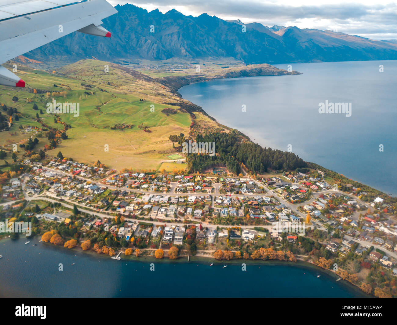Aerial View from an Airplane Window flying over queenstown New Zealand ...