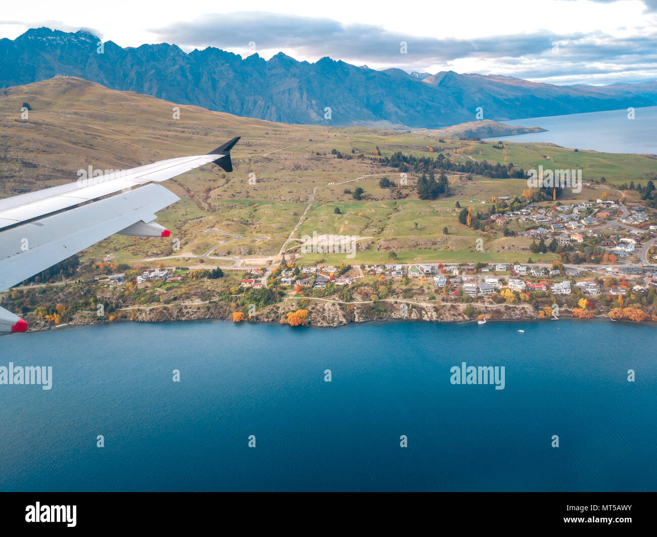 Aerial View from an Airplane Window flying over queenstown New Zealand ...