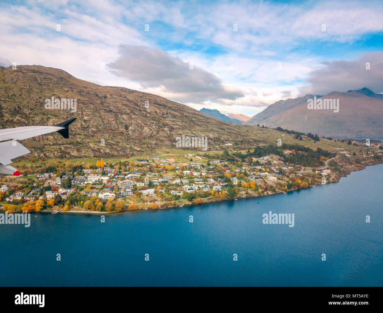 Aerial View from an Airplane Window flying over queenstown New Zealand ...