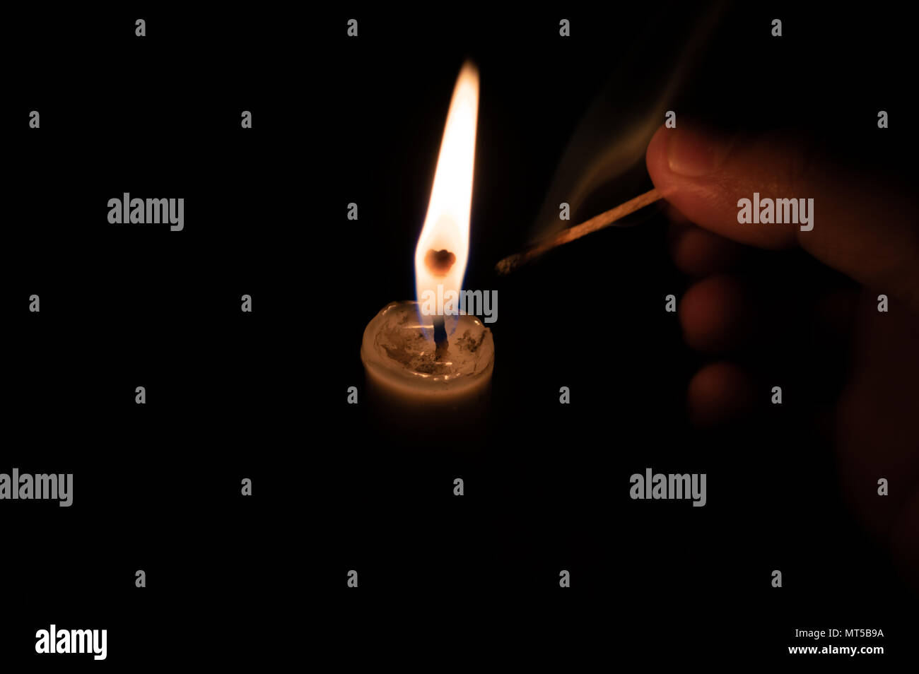 Burning candle matchstick hi-res stock photography and images - Alamy