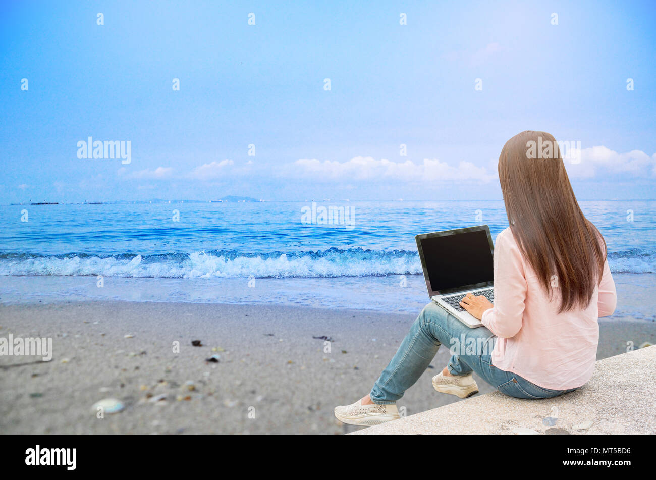 Beautiful business working woman using Iphone Ipad while working with ...