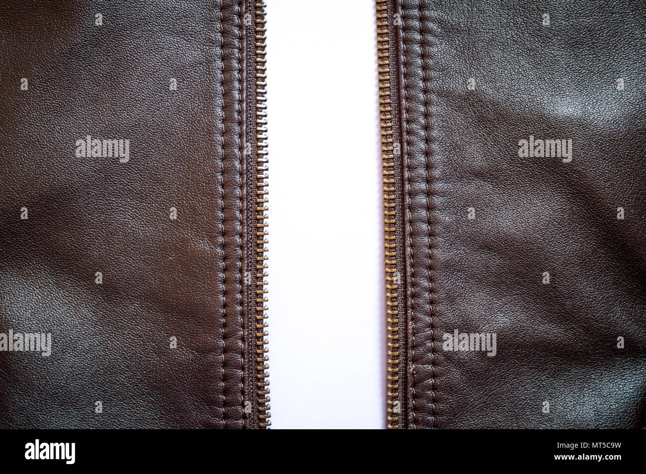 An unzipped brown leather jacket wide open Stock Photo - Alamy