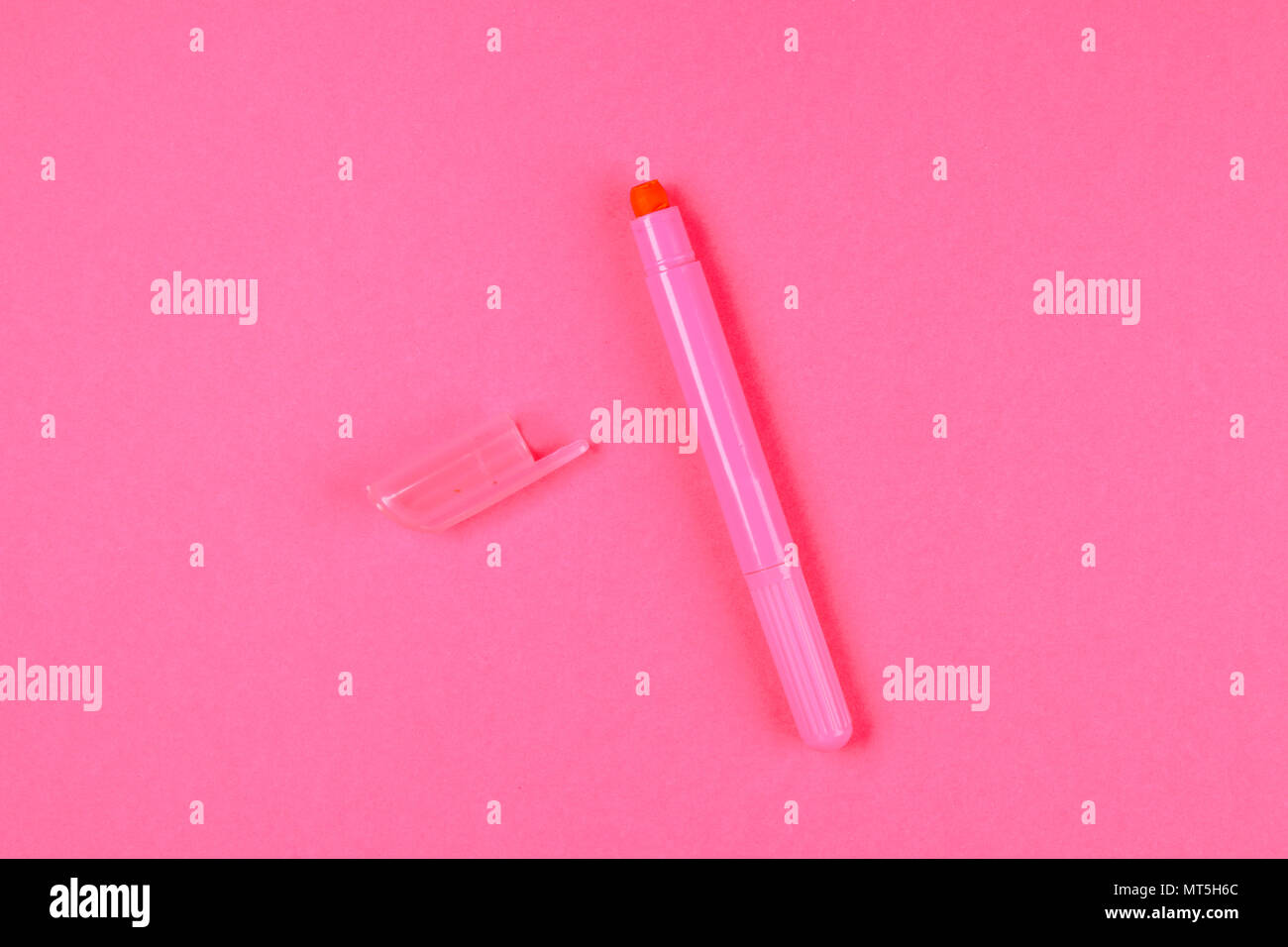 Pink felt-tip pen on a pink pastel background. Summer. Top view. Flat ...