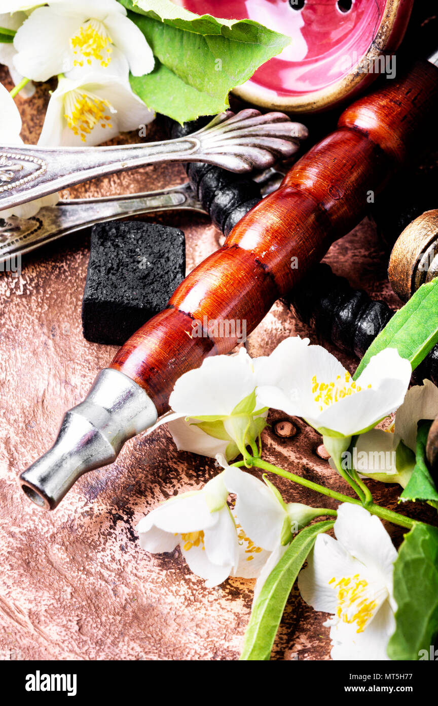 exotic hookah with jasmine floral scent.Shisha concept.Modern hookah ...