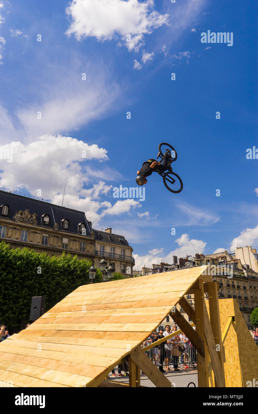 PARIS ,FRANCE- 27 May 2018: young man on bmx doing tricks, during a ...