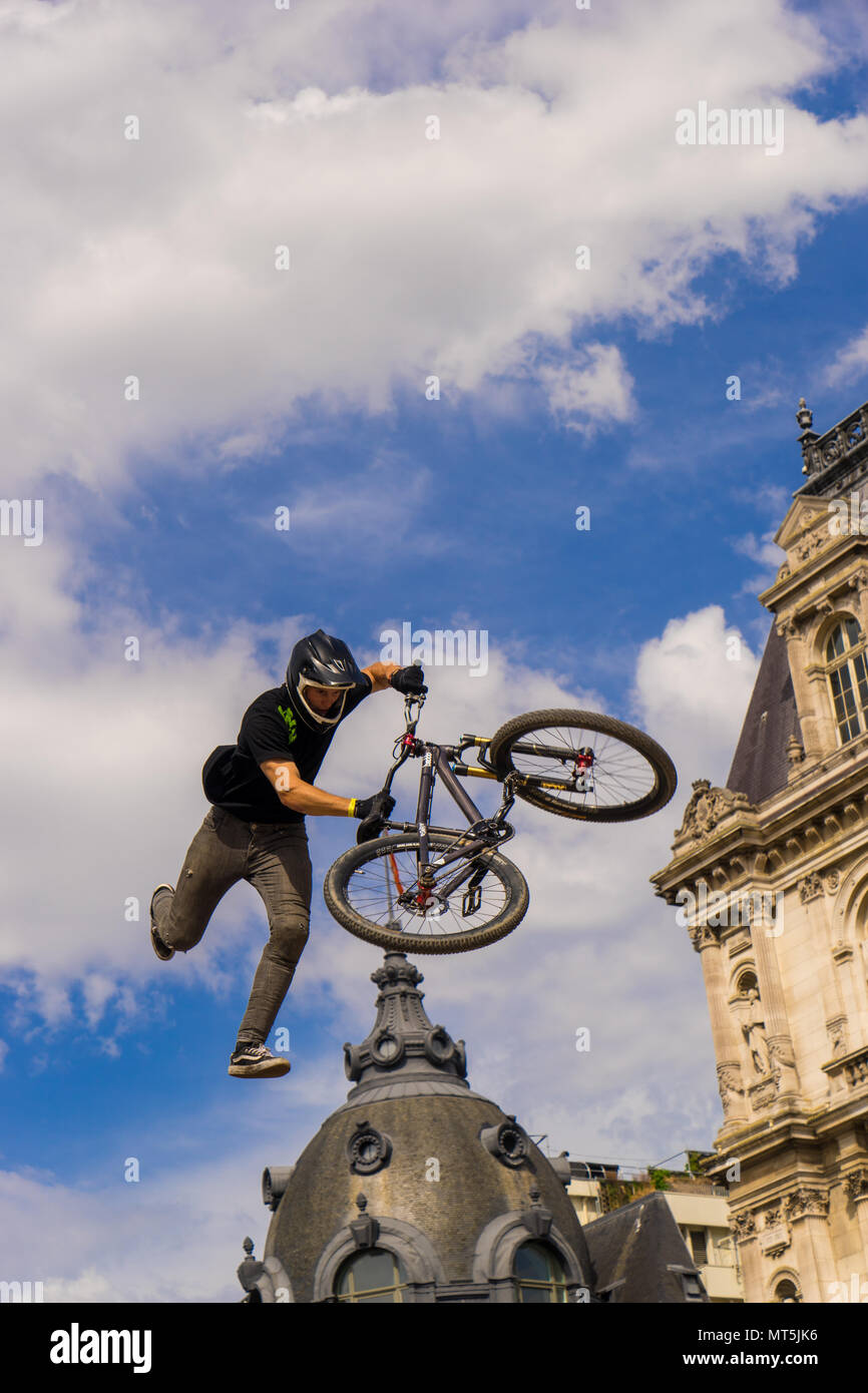 PARIS ,FRANCE- 27 May 2018: young man on bmx doing tricks, during a ...