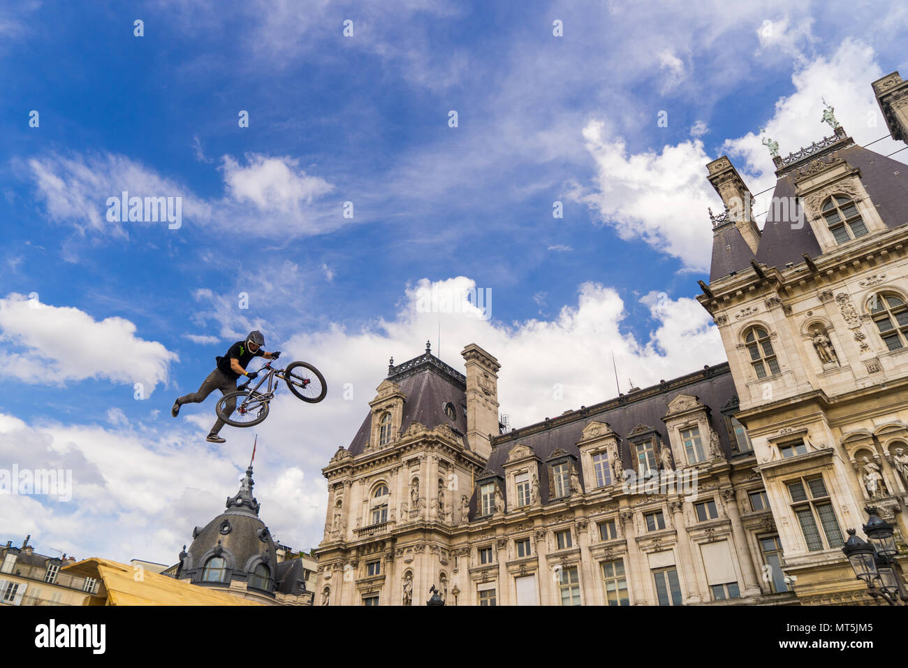 PARIS ,FRANCE- 27 May 2018: young man on bmx doing tricks, during a ...