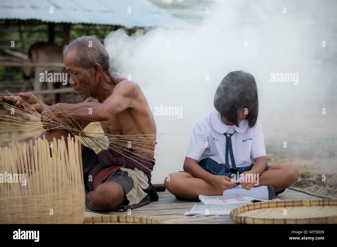 Old man and girl with rural life in countryside Stock Photo - Alamy
