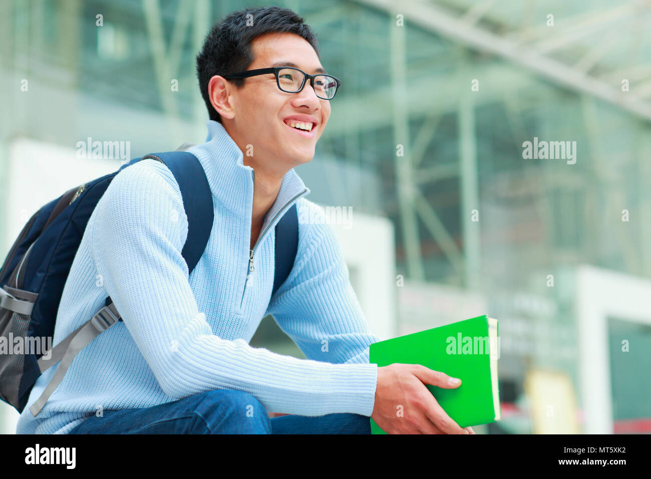 one happy confident young Chinese college student in campus Stock Photo ...