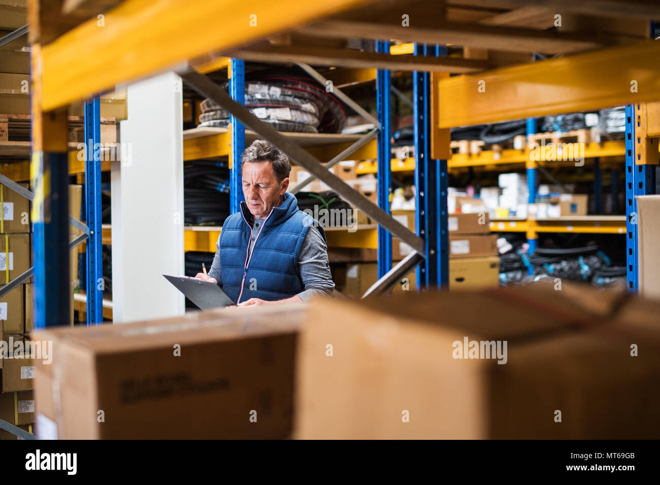Portrait of a senior male warehouse worker or a supervisor Stock Photo ...