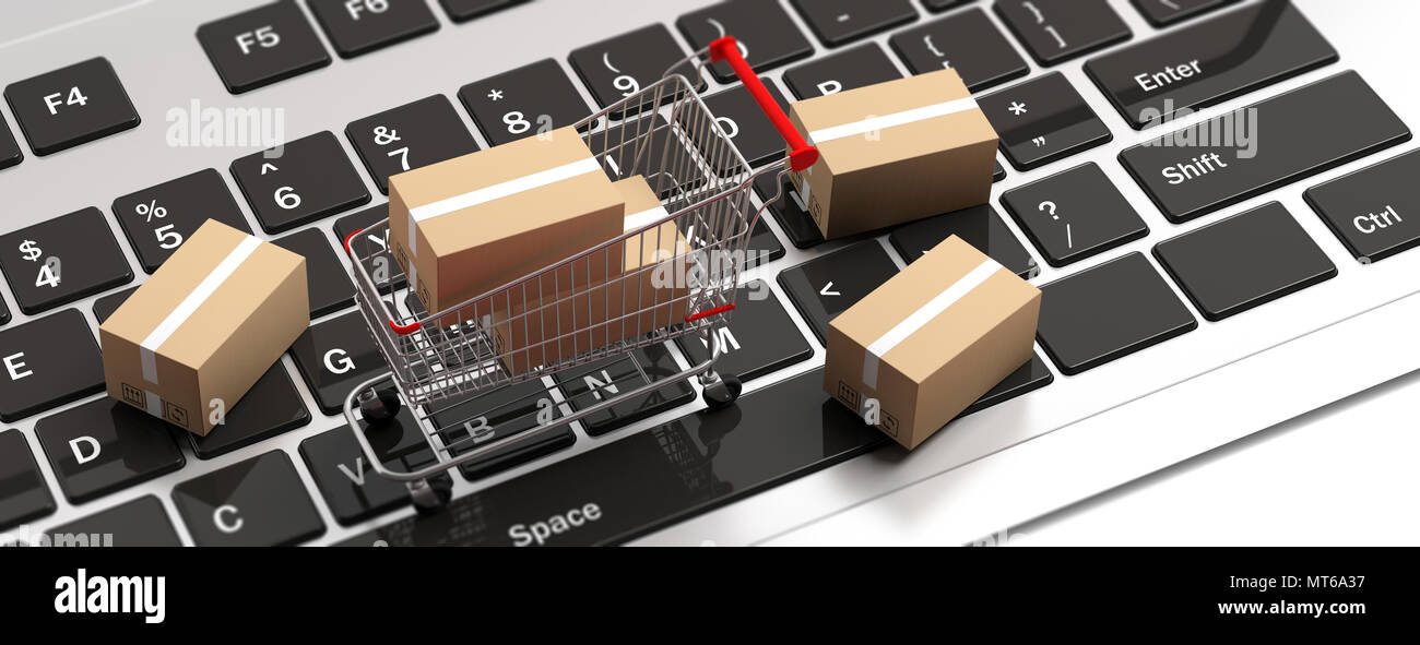 Online shopping. Boxes closed and a shopping cart on computer laptop ...