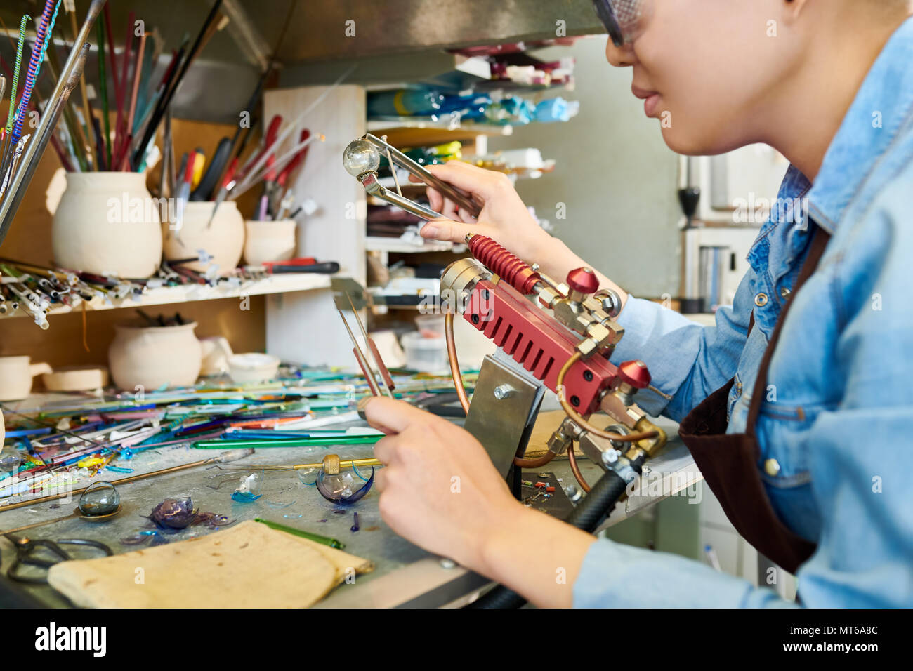 Asian Artist Doing Lampwork in Studio Stock Photo - Alamy