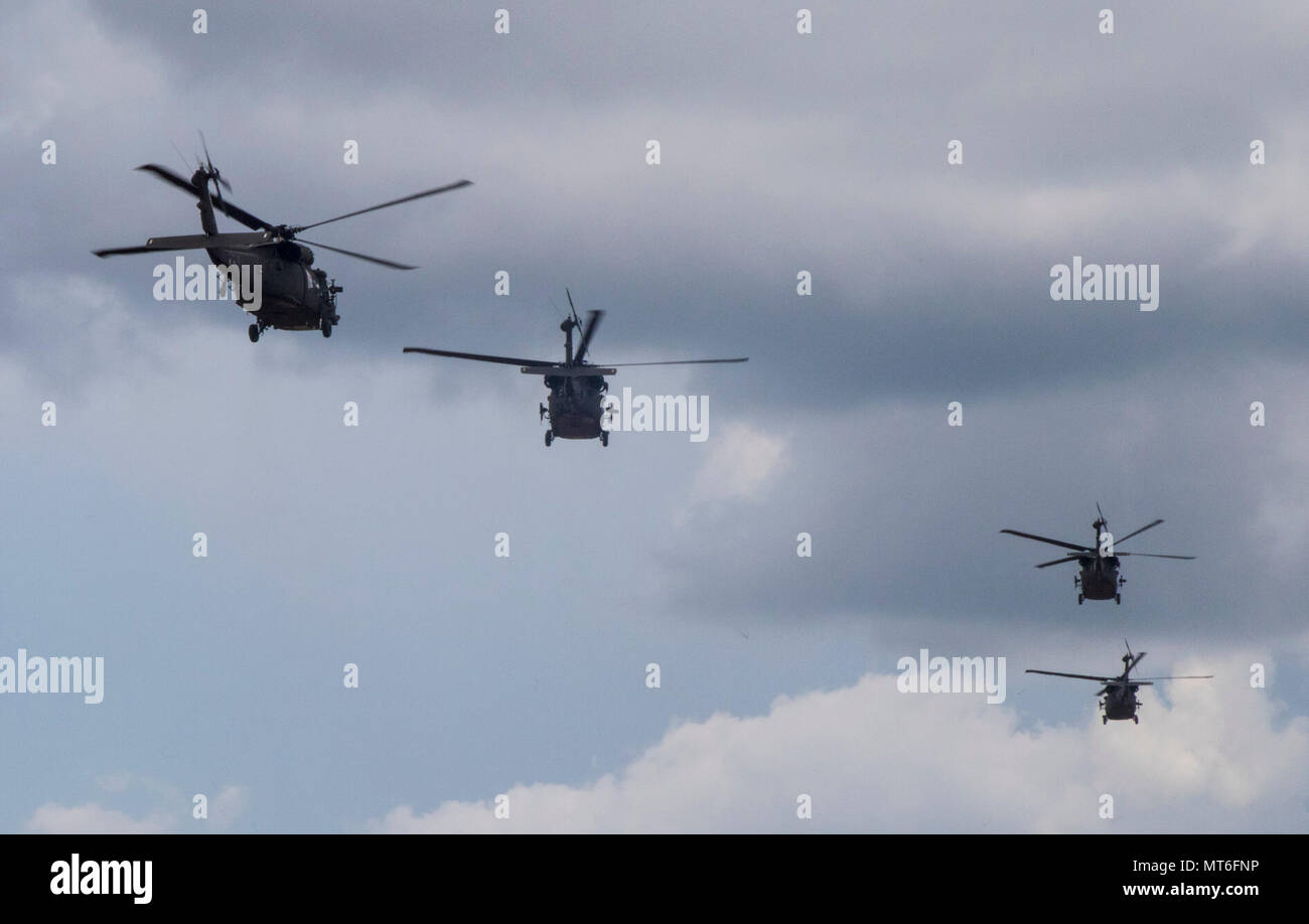 UH-60 Black Hawk helicopters transport soldiers with the 76th Infantry ...